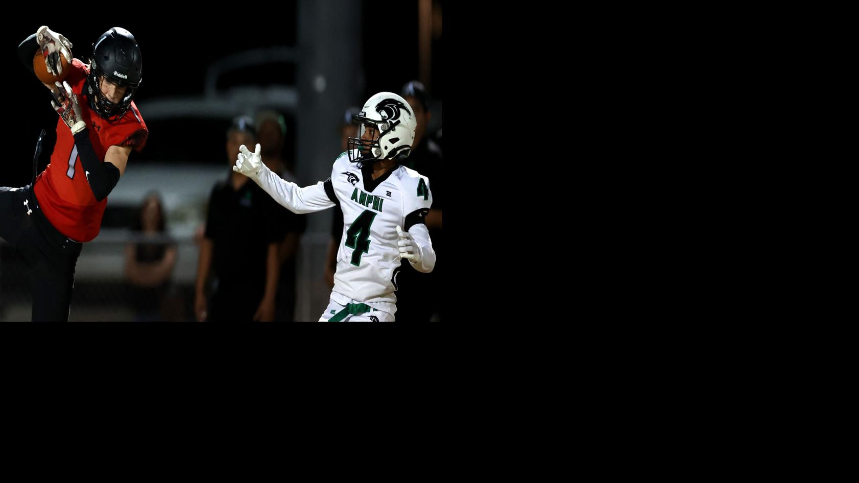 Photos: Empire hangs on to drop visiting Amphi 27-20, high school ...