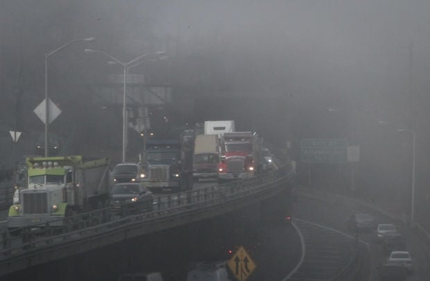 Photos: Eerie, fog-filled Wednesday morning on the East Coast