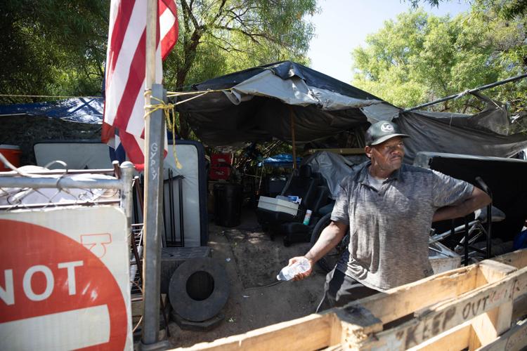 Photos: Tucson Homeless encampment in '100 acre woods'