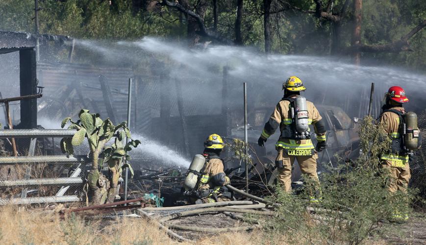 Debris and brush fire produces heavy smoke in South Tucson