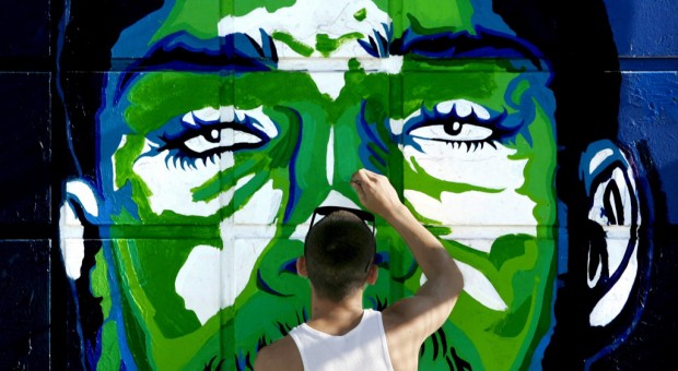 Overpass mural gives youths creative say in neighborhood