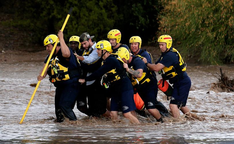 Storm dumps over 2 inches on Tucson's west side, 2 swift water rescues ...