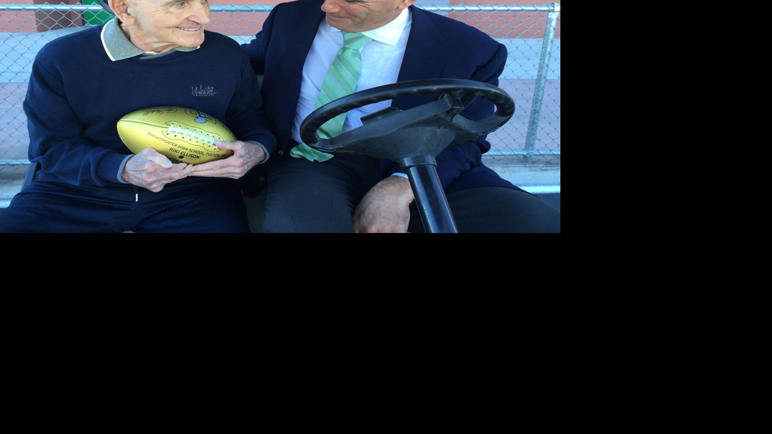 Ellison presents Amphi High with an NFL Golden Football