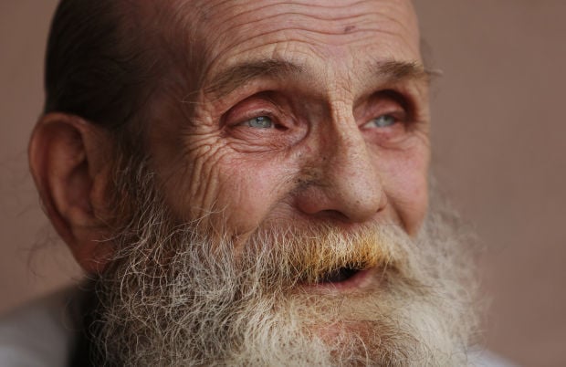 Life of hardship can't dull his 'love of whole world'