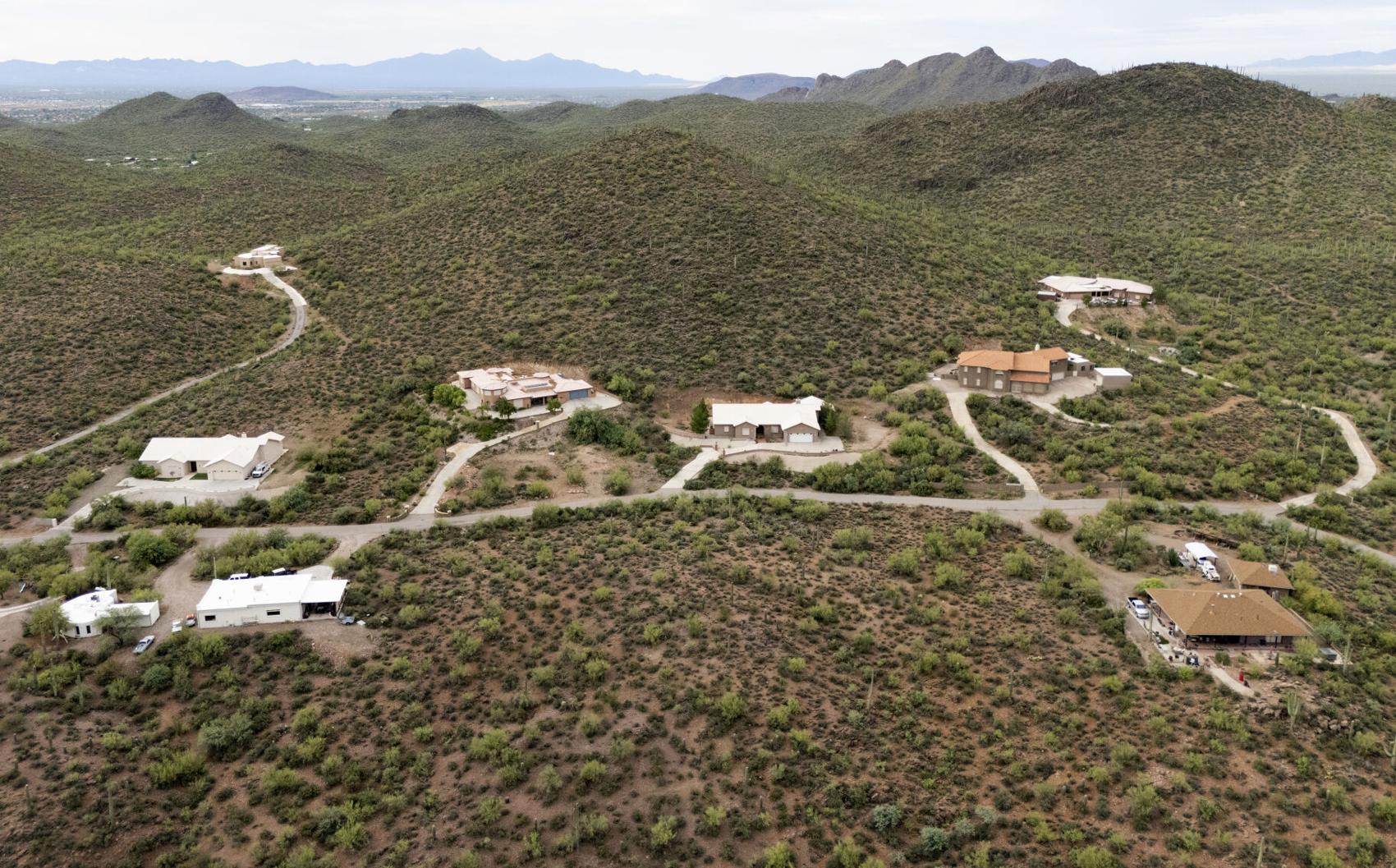 Tucson church leader accumulated property as members paid