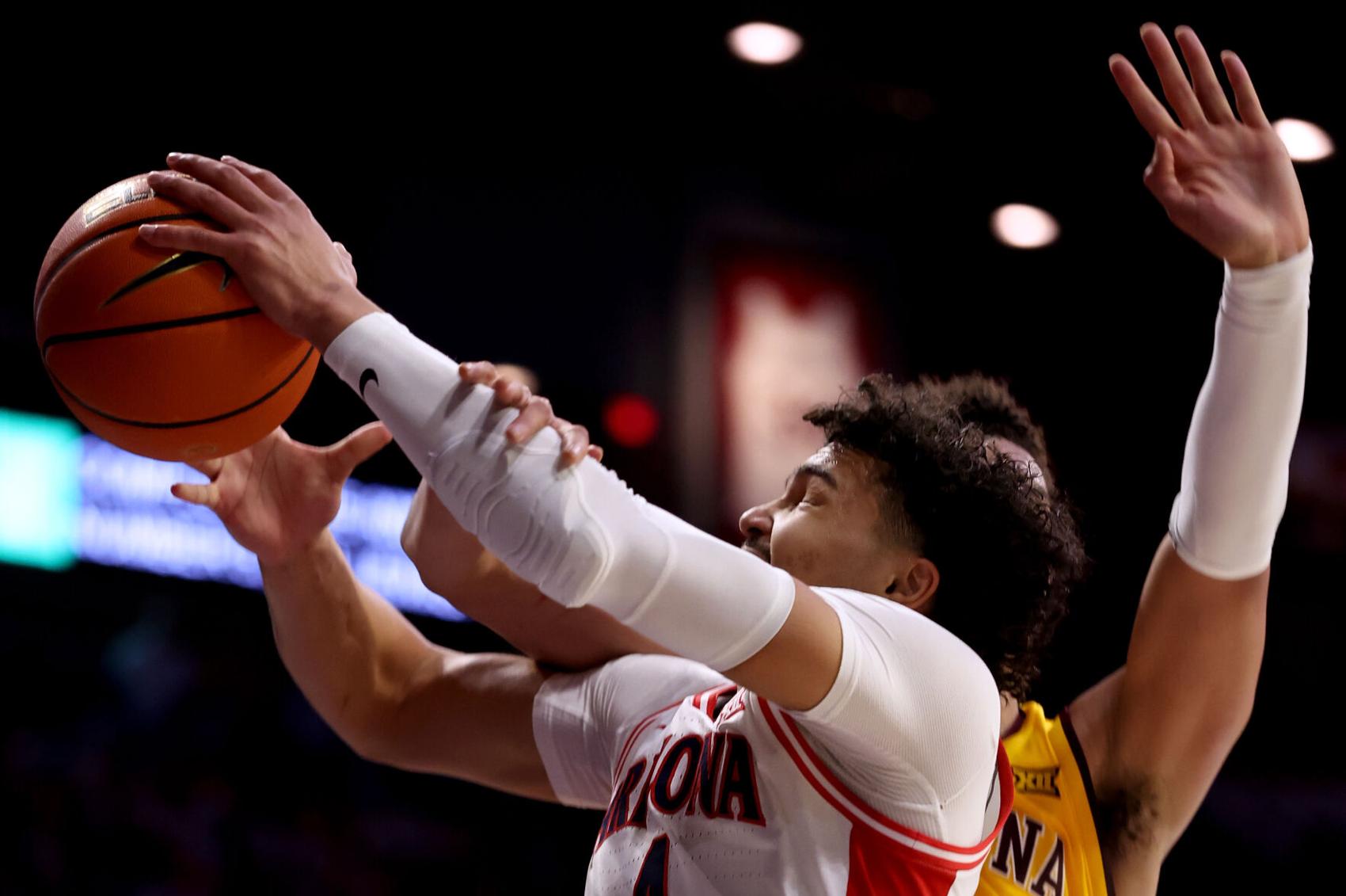 Arizona outlasts ASU 113-100 in wild season finale