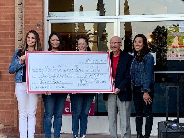 Kids of Steele donates $180K to UA children's research center