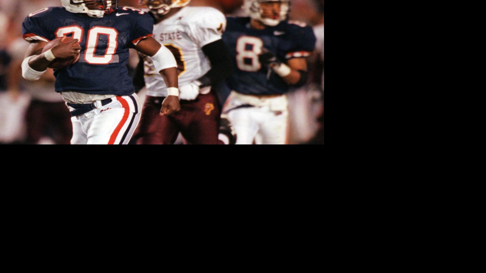 20 years later, former Arizona Wildcats star Trung Canidate still ...