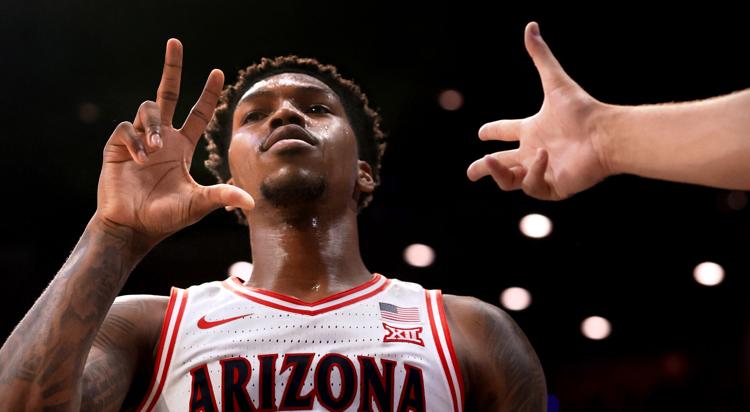 Caleb Love's big two-way night gives Arizona Wildcats breathing room in ...