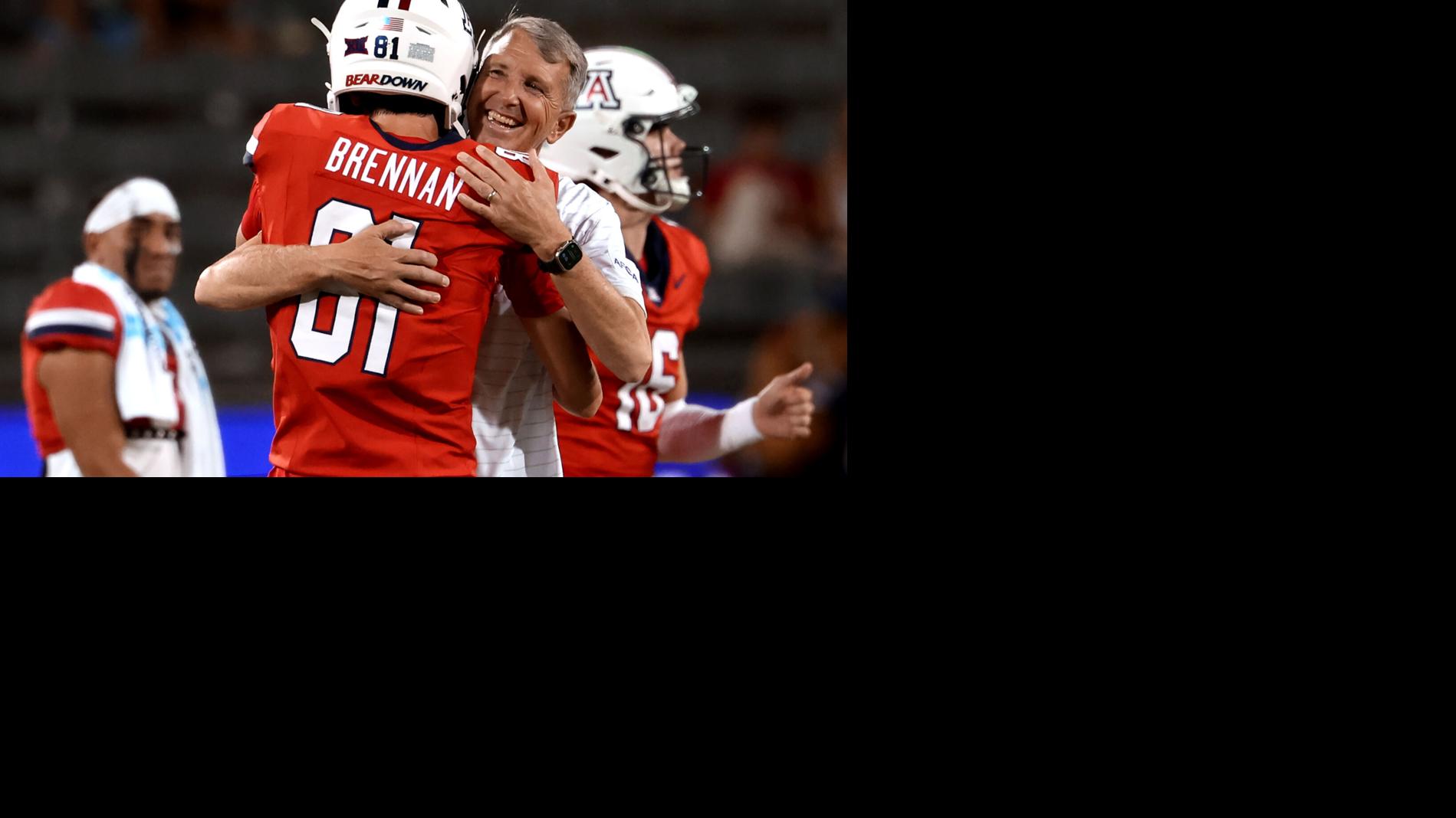 Arizona football coach dons uniform to uplift players