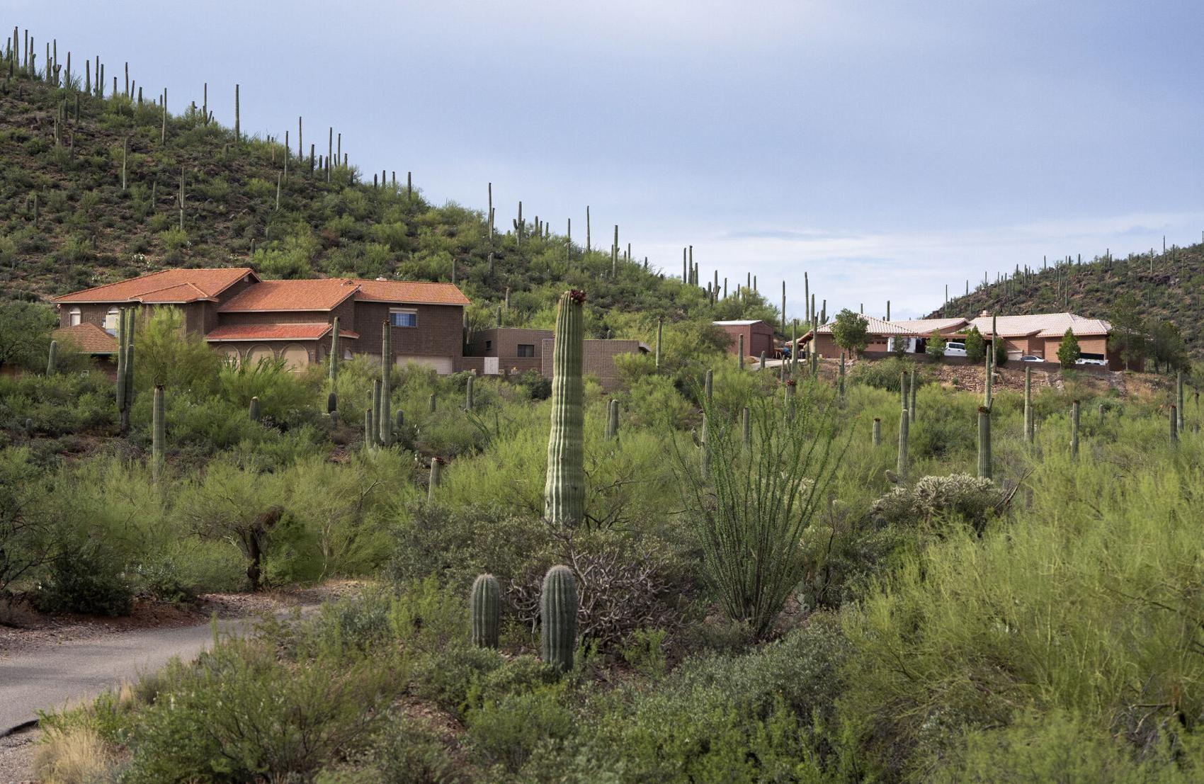 Tucson church leader accumulated property as members paid