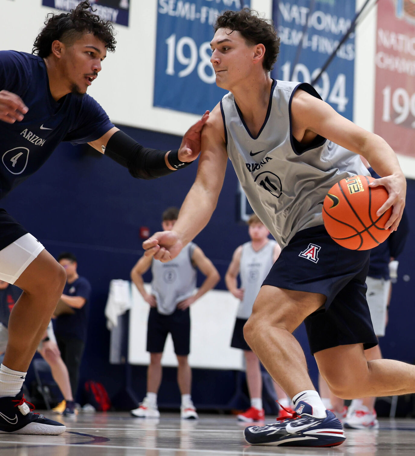 Liam Lloyd content with walk-on role on dad's Arizona roster