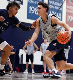 Liam Lloyd content with walk-on role on dad's Arizona roster