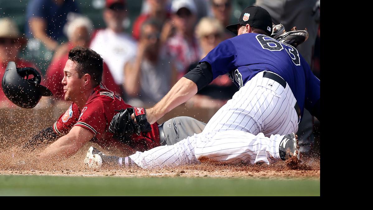 Photos: D-backs vs. Rockies spring training baseball