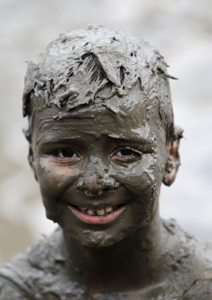 Photos: Mud Day looks fun for mudders, not mothers doing laundry