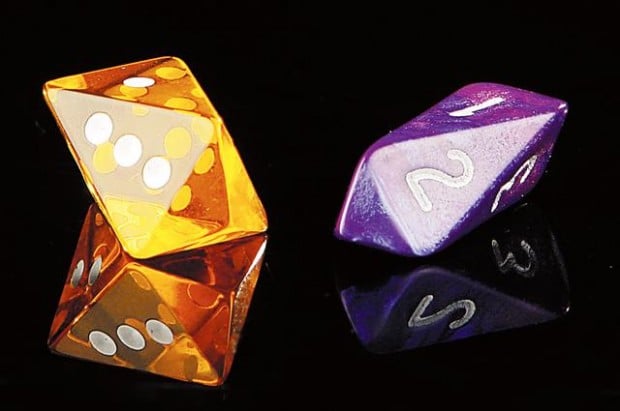 Fancy-dice maker sees patent case roll his way