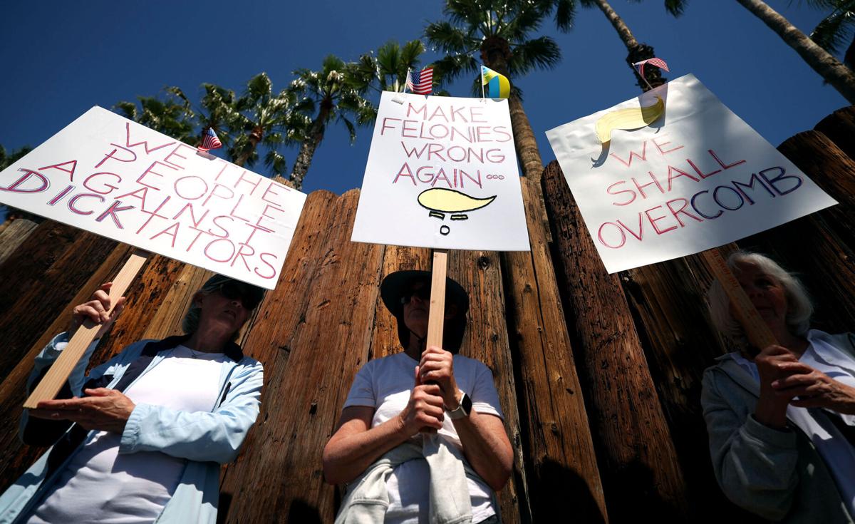 Photos: Thousands protest President Trump in Tucson