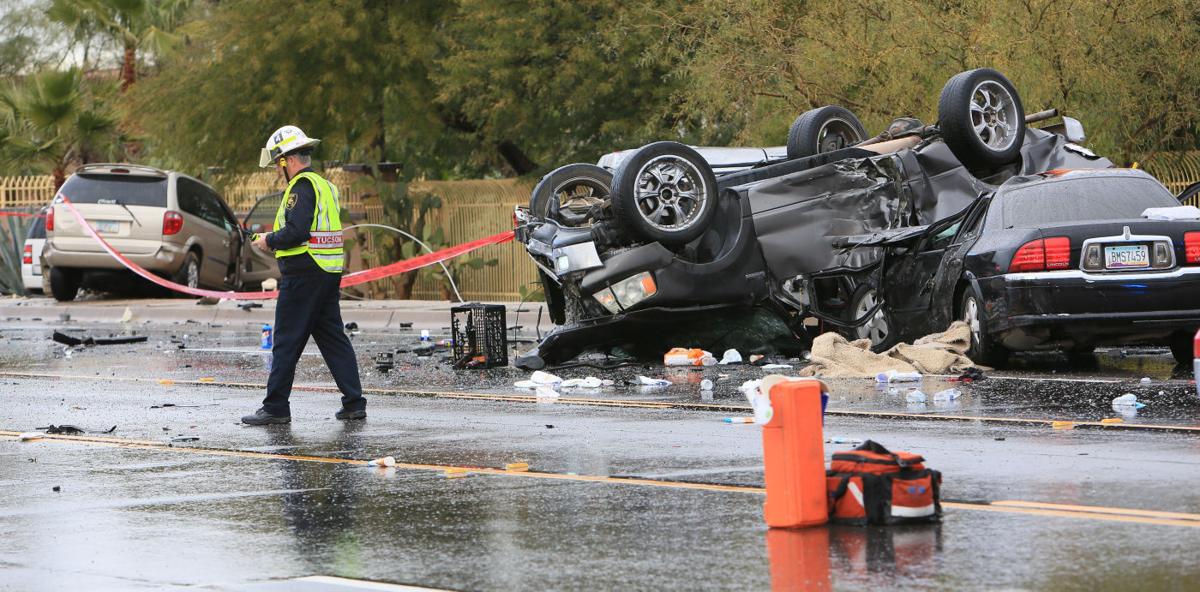 Tucson storm prompts swift-water rescue, multi-car crash