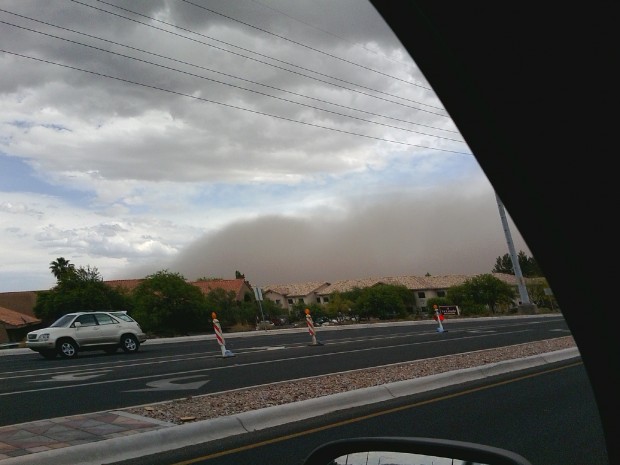 Photos: Dust storm rolls across Tucson