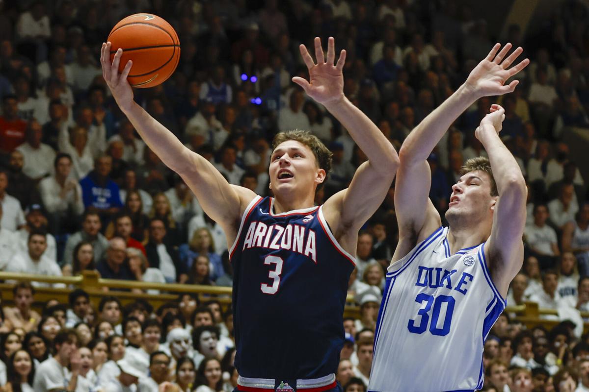 Johnson's late hoop sends No. 12 Arizona past No. 2 Duke