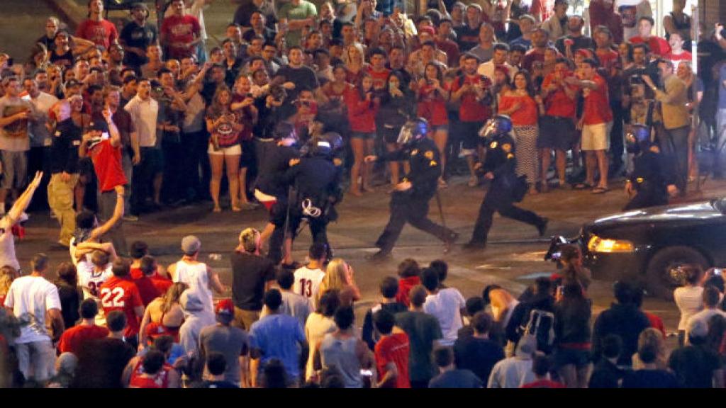 Police fire pepper spray at crowds near UA; 15 arrested (with video ...