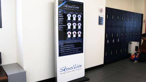 Schools open halls to electronic billboards