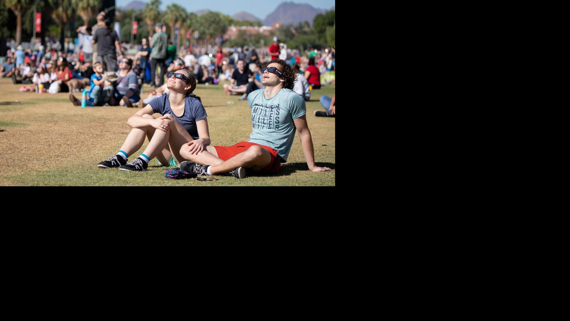 Photos: Tucsonans gather to watch the partial solar eclipse on the UA Mall