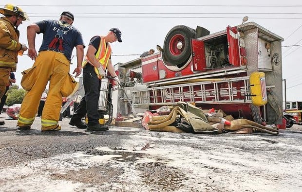 Fire engine overturns at intersection