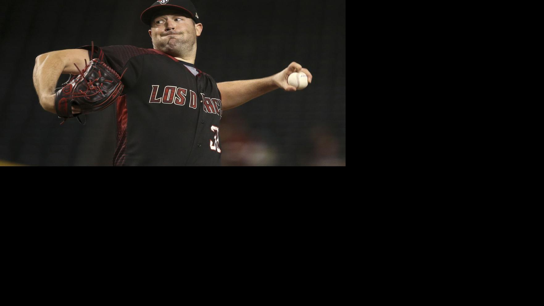 D-backs rally past Marlins in must-win game