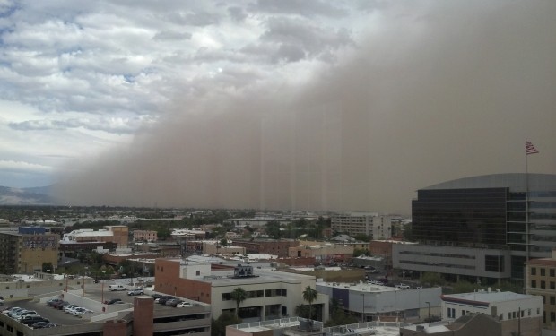 Photos: Dust storm rolls across Tucson