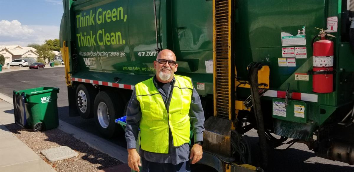 Recycle truck driver belled for helping neighborhood