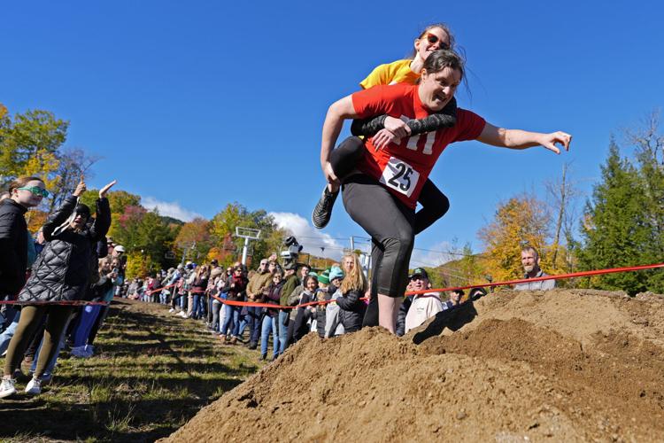 Wife-carrying championship brings couples to Maine