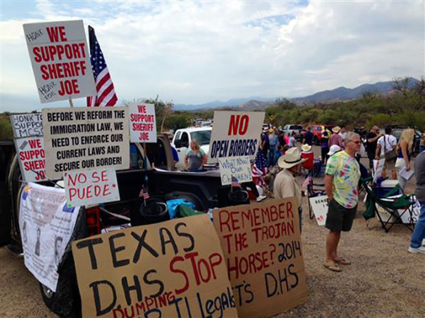 Demonstrators rally over transfer of young immigrants