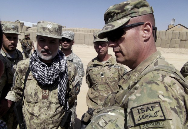 Riled by Taliban, Afghan villagers take up arms