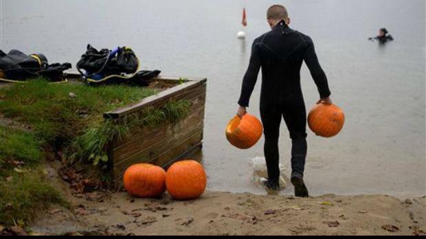 Underwater pumpkin carving; longest popcorn string; Music Man Square ...