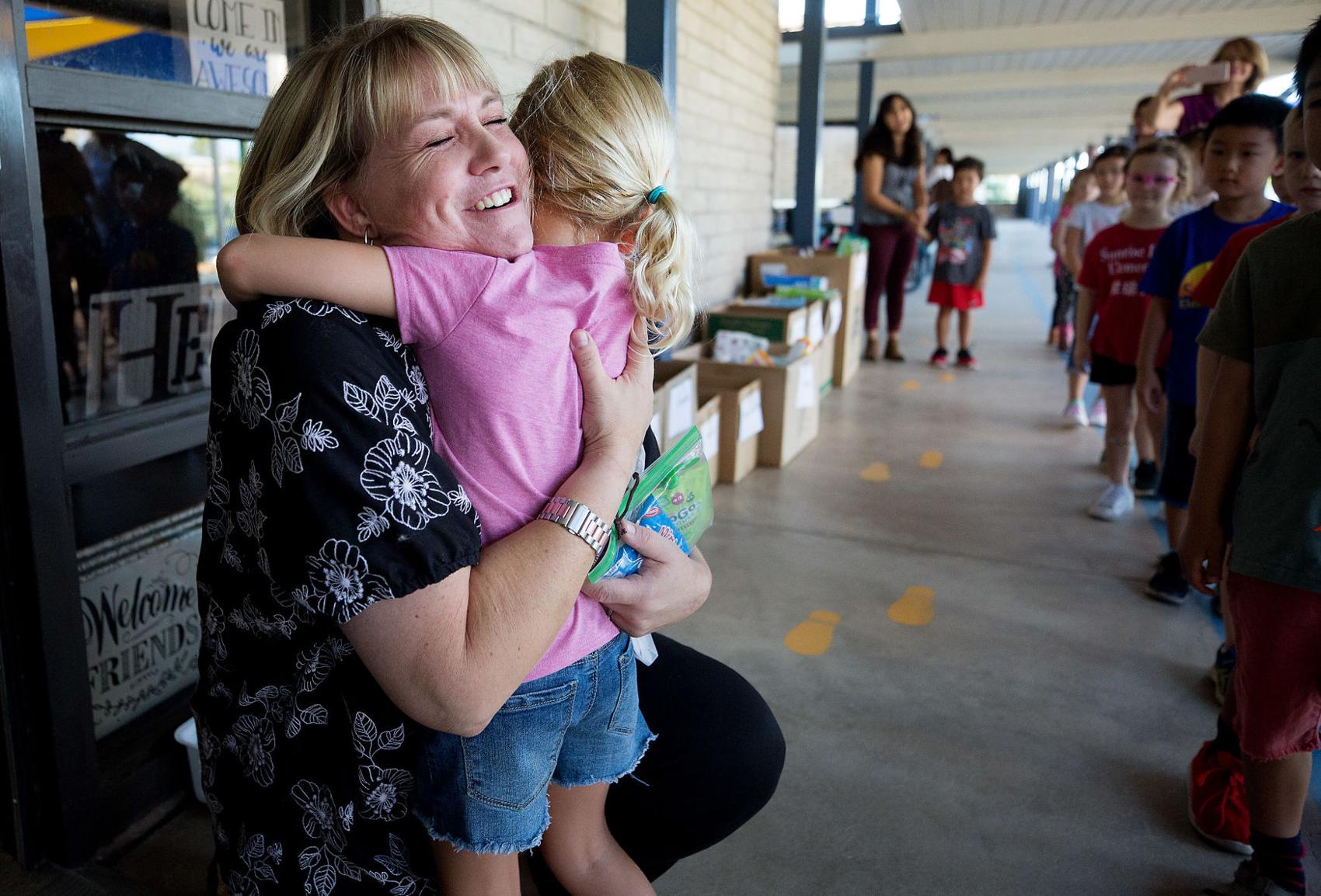 Photos: Lots of love and hugs on the first day of school at Sunrise ...