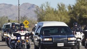 Hundreds attend Judge Roll's funeral