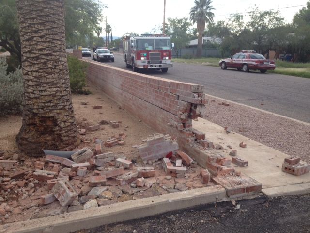 Man critical after crashing car into brick wall