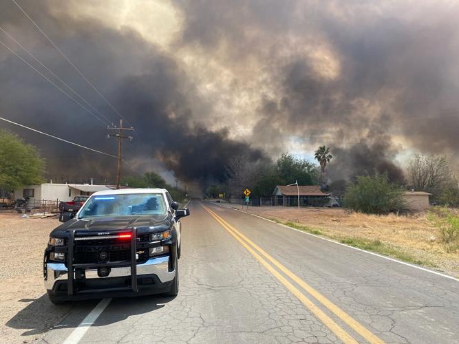 Wildfire around small mining town north of Tucson prompts evacuations