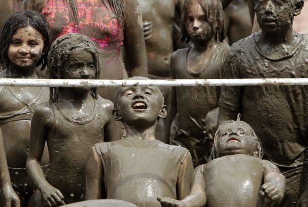 Photos: Mud Day looks fun for mudders, not mothers doing laundry ...