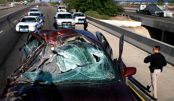 Freeway crash NW of Tucson traps car under tractor-trailer