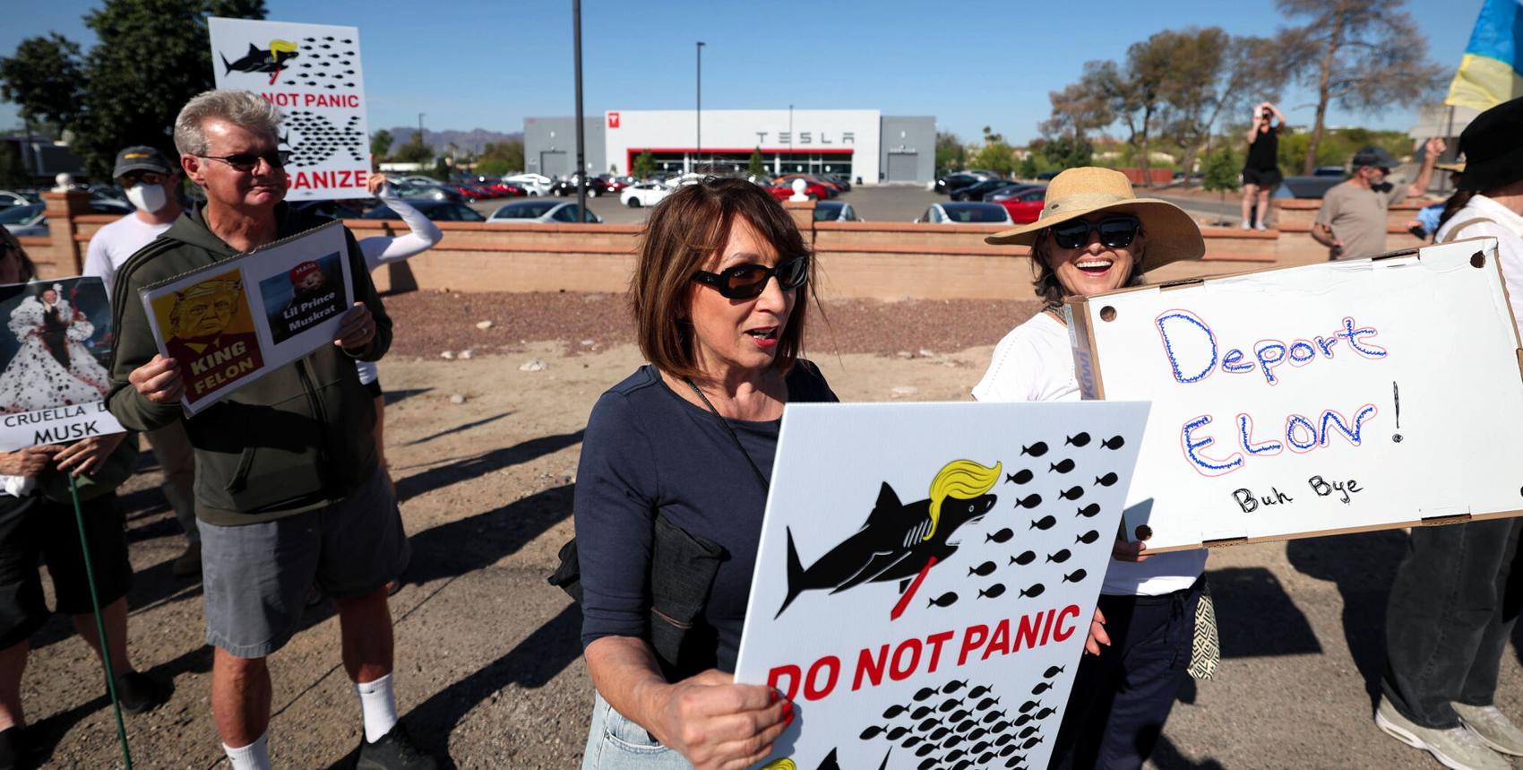 Photos: Large anti-Elon Musk protest at Tucson Tesla dealership