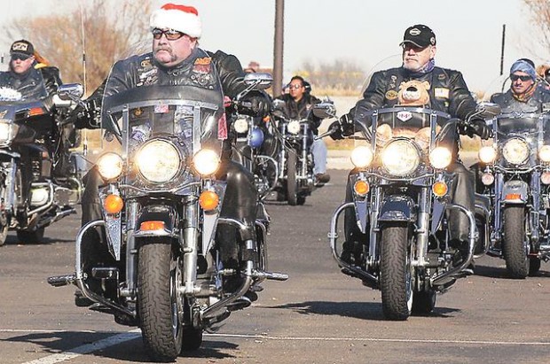 Santa rides a hog Around the West
