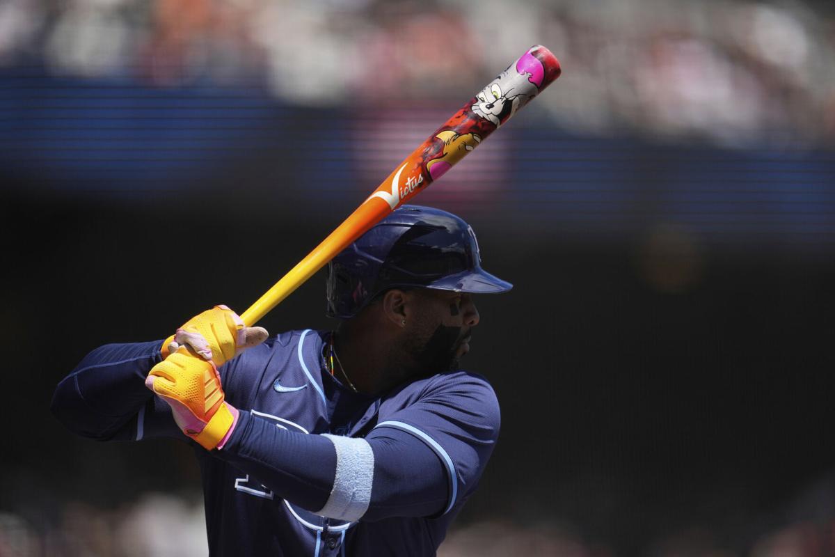 PHOTOS: MLB players showcase personalities with custom bats, cleats