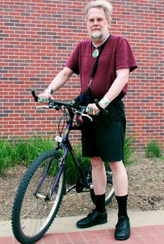 Rain or shine, professor rides bike to and from campus | University ...