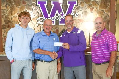 Local presents another check to Walhalla golf team from ball sale ...