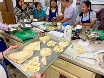 Students bake apple pies at International House American Cultural ...