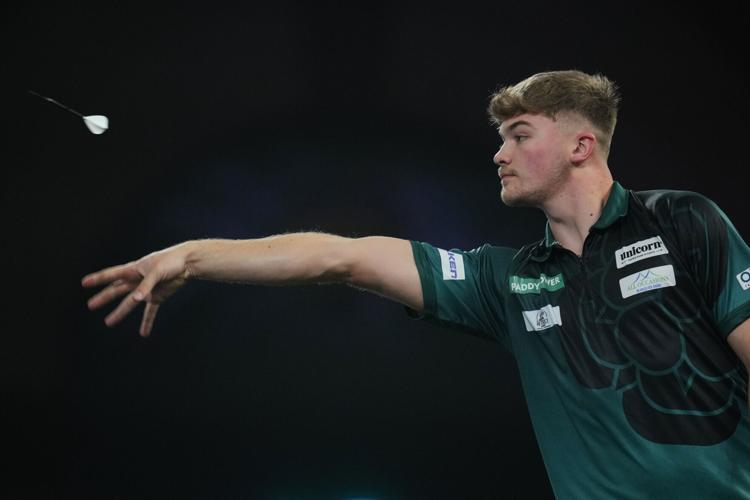 Costumes and competitors light up the World Darts Championships in ...