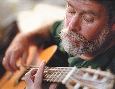 Guitarist Thomas Sheeley performs 'Romantic Music for A Summer ...