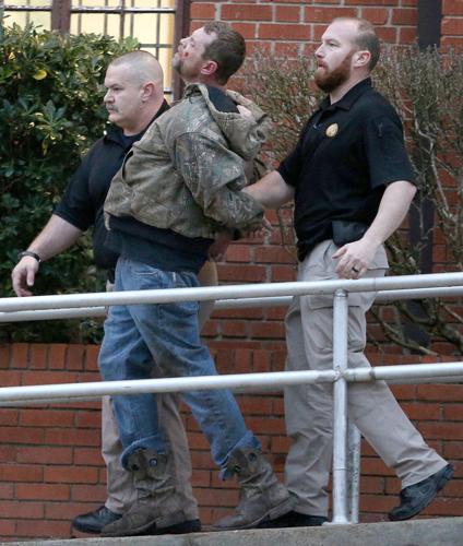 Son, grandson dispute charges after outburst during Coble execution